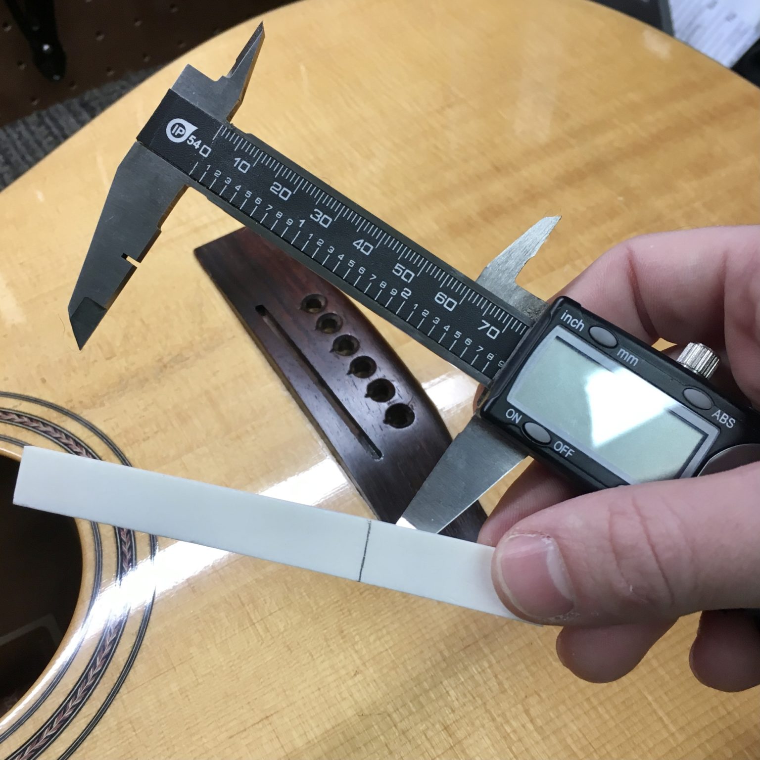 Making An Acoustic Guitar Saddle - Calico Guitarworks