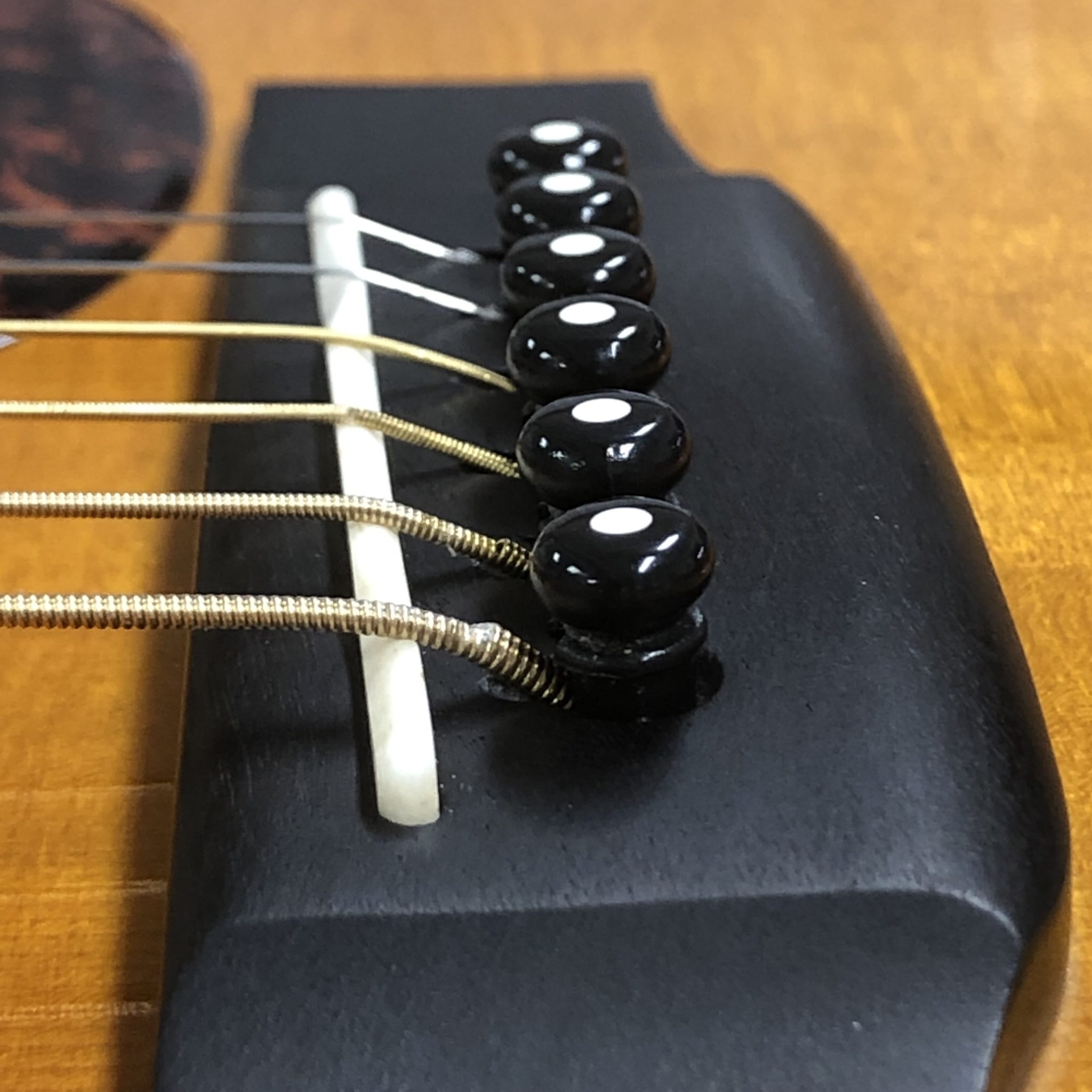Acoustic Guitar Bridge String Ramping - Calico Guitarworks